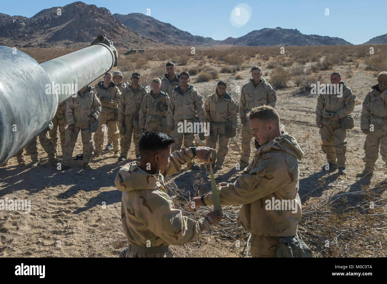 U.S. Marine Corps Lance Cpl. Xavier Swank, left, a Chemical, Biological ...