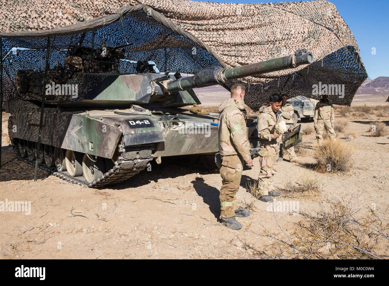 U.S. Marine Corps Lance Cpl. Xavier Swank, right, a Chemical ...