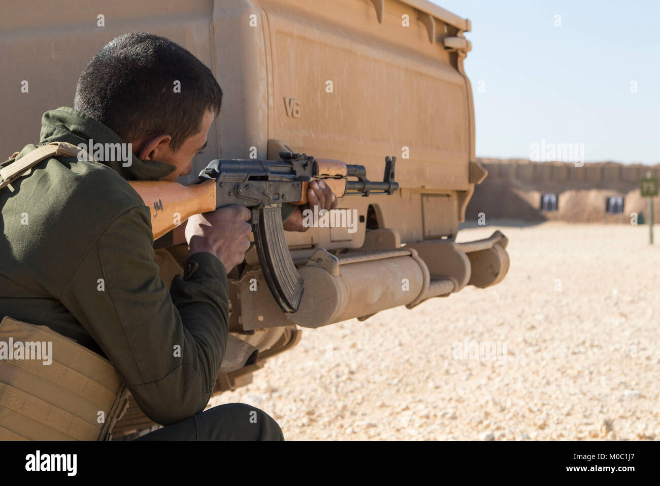 Raqqa Internal Security Force students learn how to shoot around ...