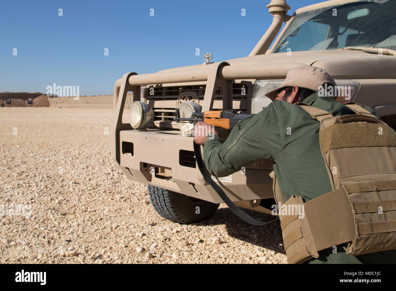 Raqqa Internal Security Force students learn how to shoot around ...