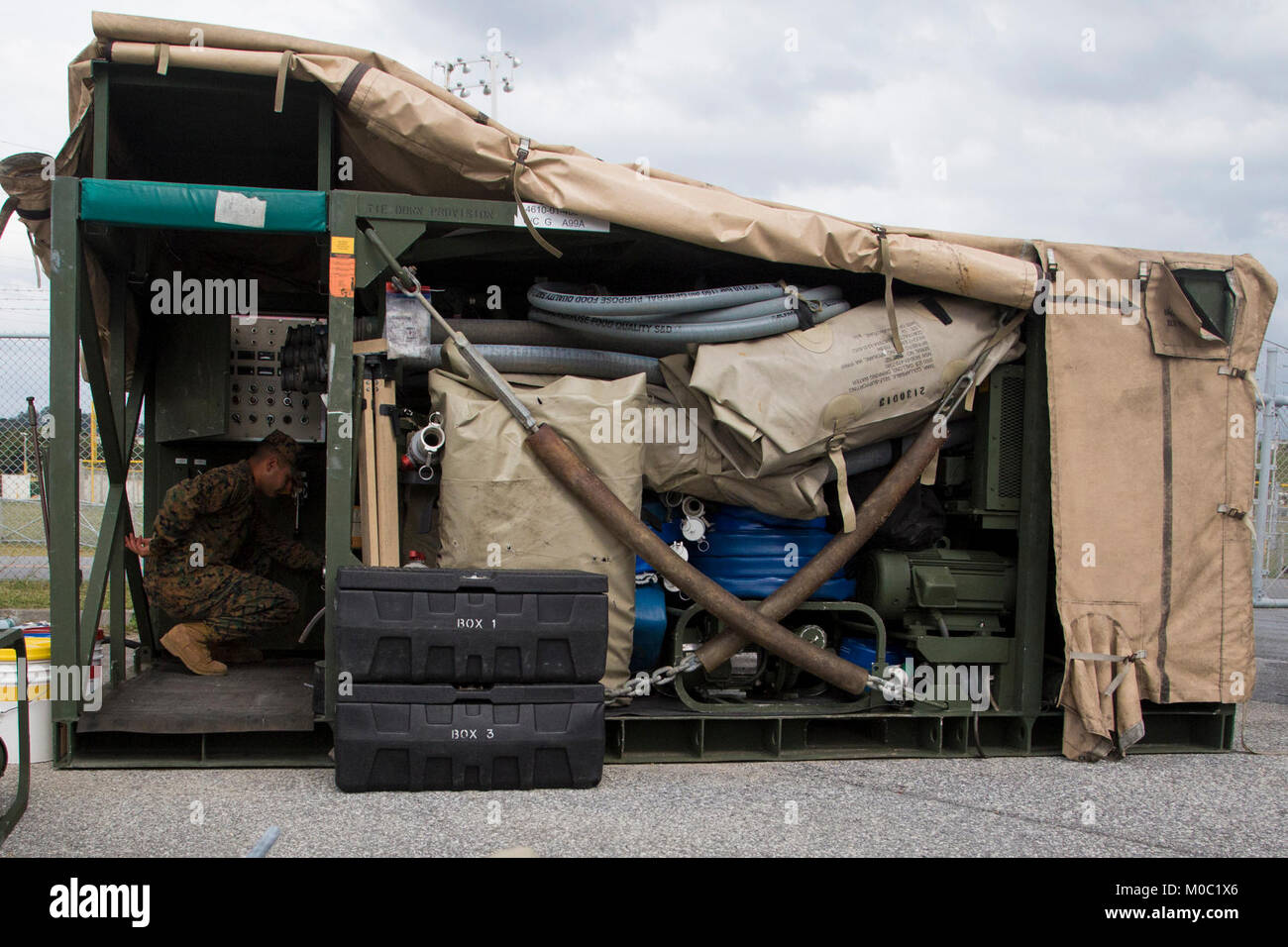 CAMP FOSTER, OKINAWA, Japan – Lance Cpl. Abdul Zhaiya conducts standard ...