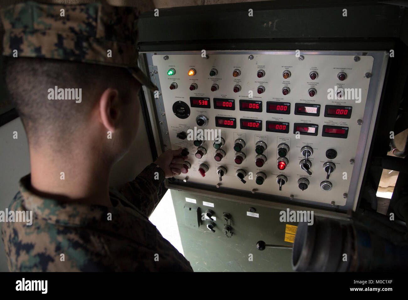 CAMP FOSTER, OKINAWA, Japan – Lance Cpl. Abdul Zhaiya conducts standard ...