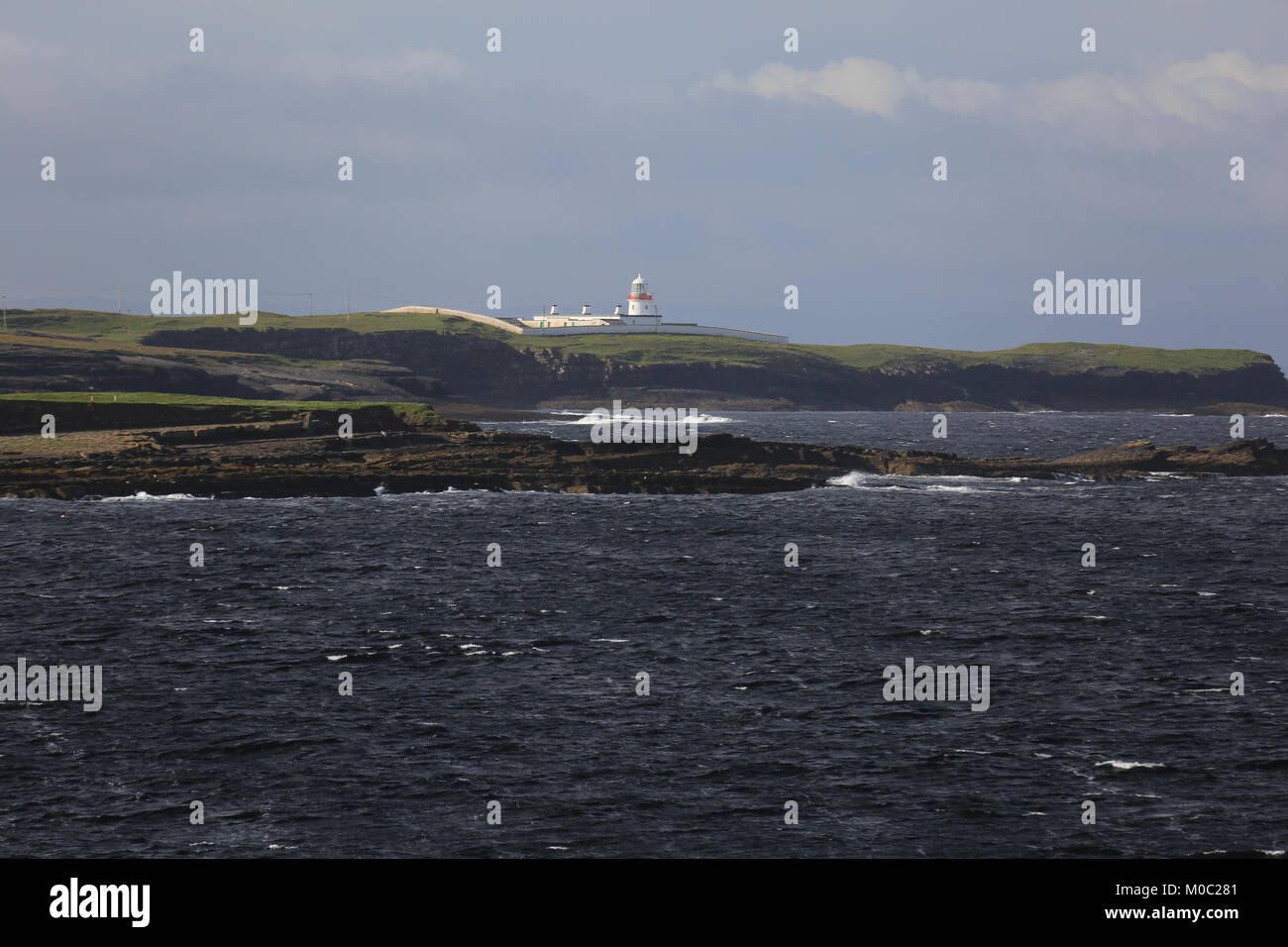 coastal lighthouse sits on wild atlantic way, donegal, ireland Stock ...