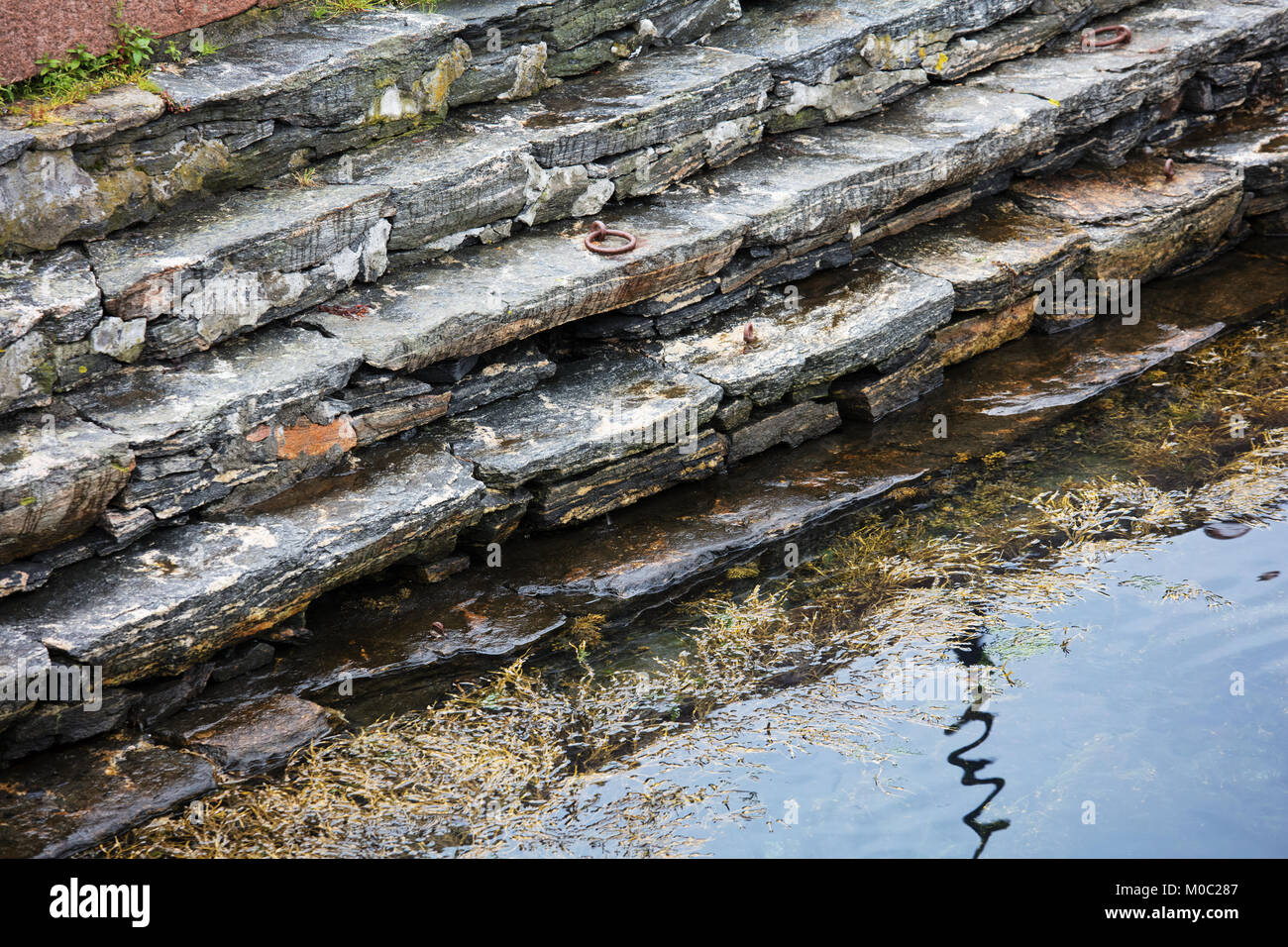 Old stone dock with steps to water hi-res stock photography and images ...
