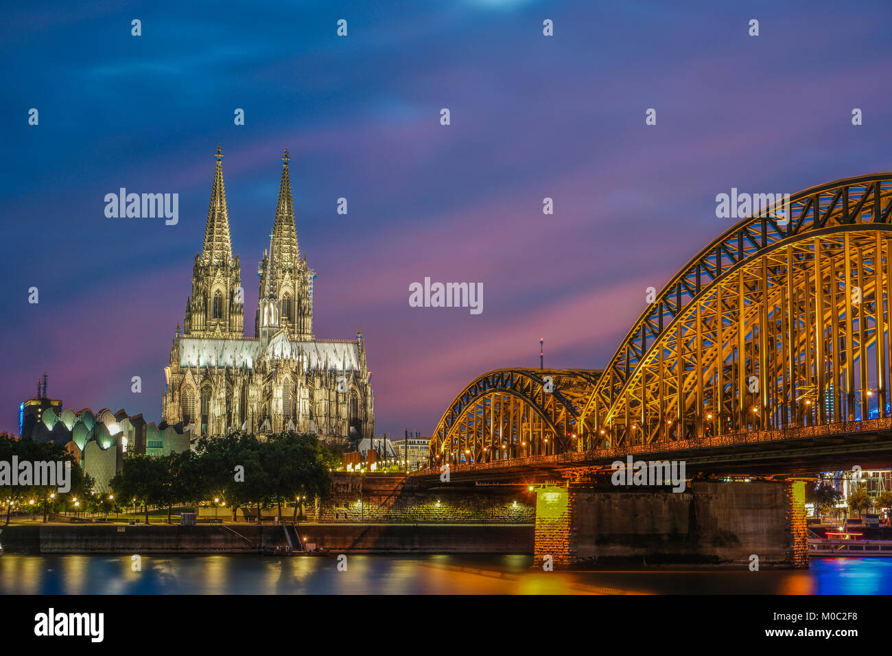 Cologne Cathedral and Hohenzollern Bridge, Koln at a bright summer day ...