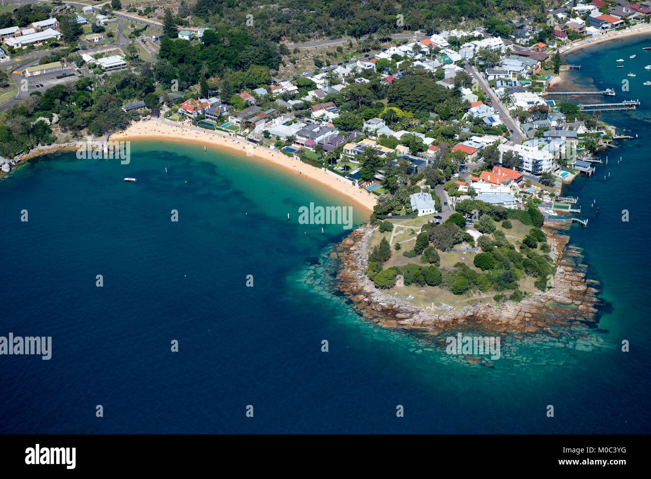 Aerial view showing a beach and headland in Sydney, New South Wales ...
