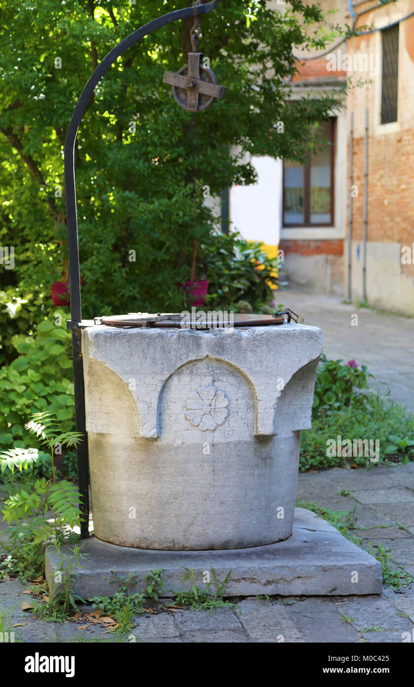 ancient stone well for rainwater collection Stock Photo - Alamy