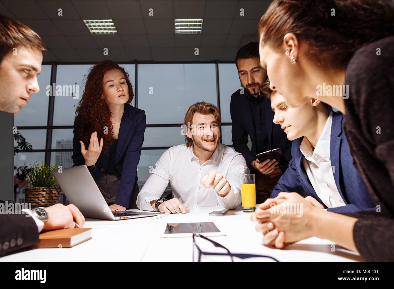 boss leader coaching in office. On job training. Business and Education ...