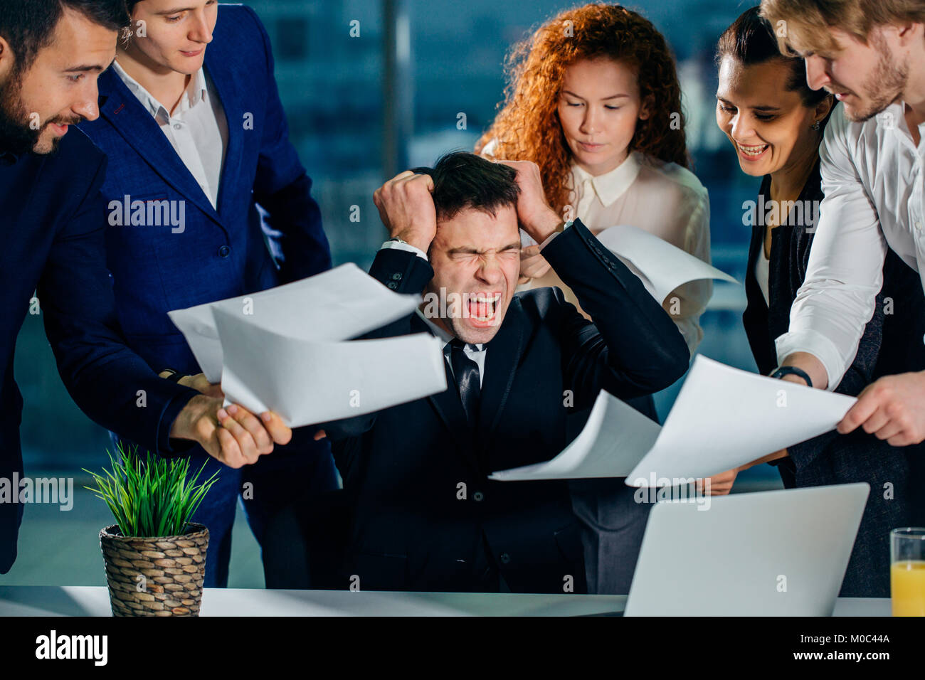 stressed Businessman in office scream, upset with employees ask for ...