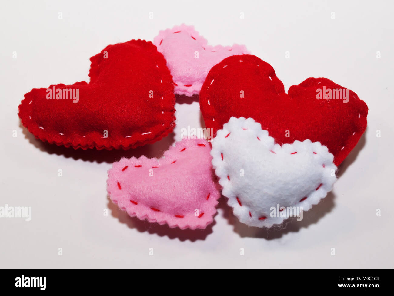 Five cloth hearts hi-res stock photography and images - Alamy
