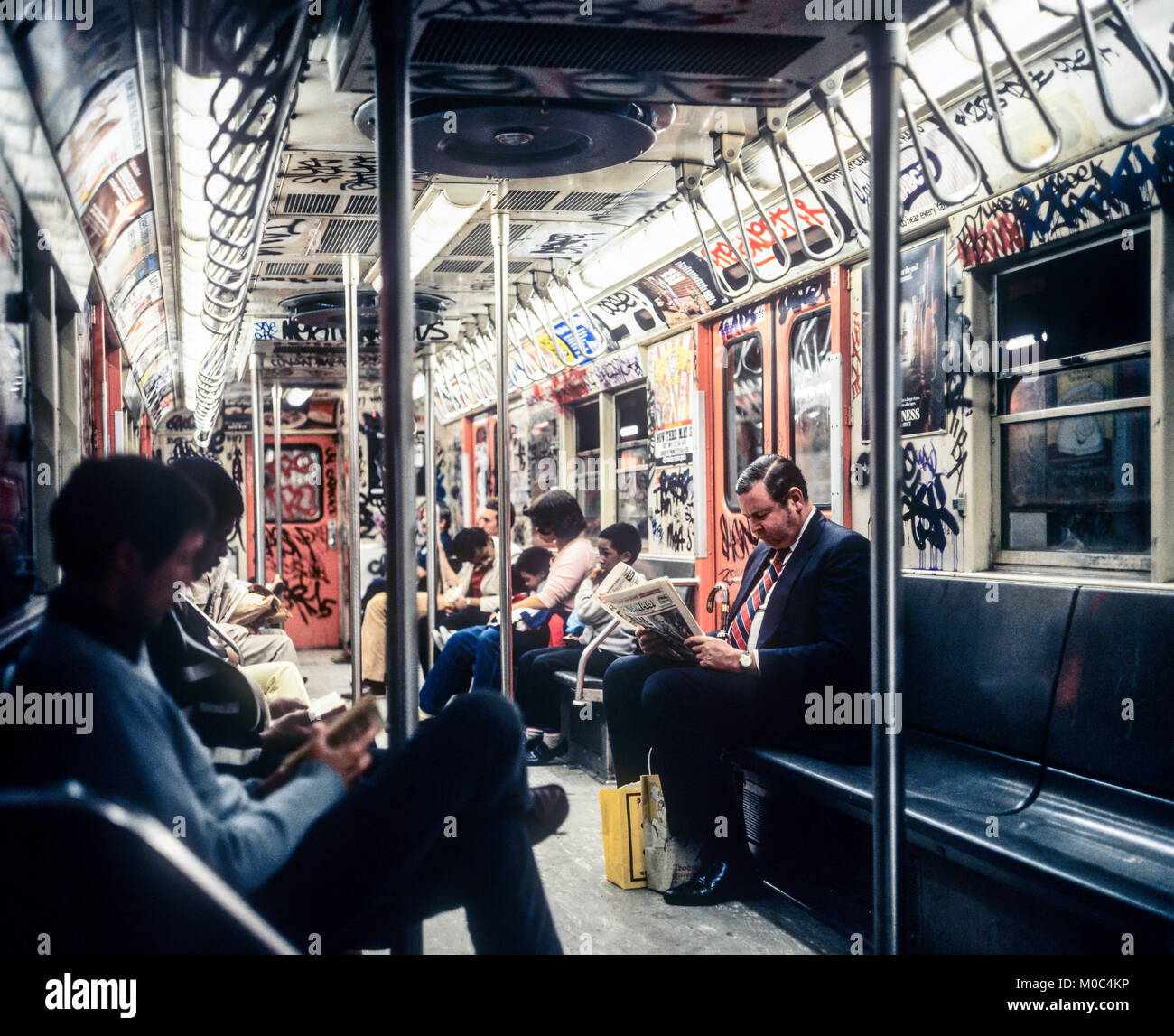 May 1982, New York, vintage subway carriage interior, passengers ...