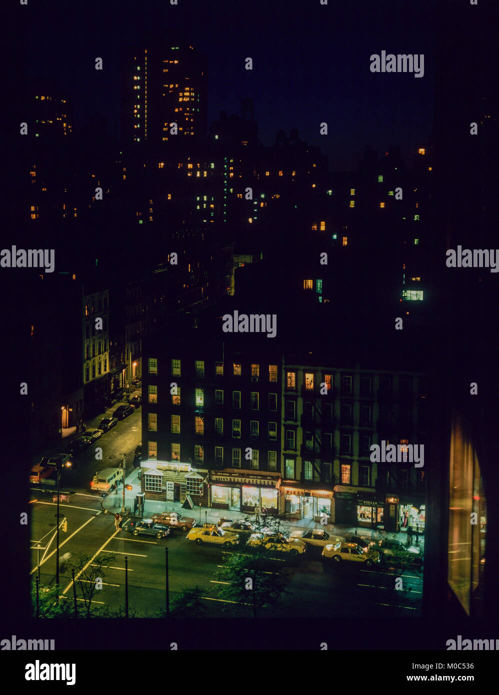MAY 1982, New York, night overview on 3rd Avenue, stores, buildings ...
