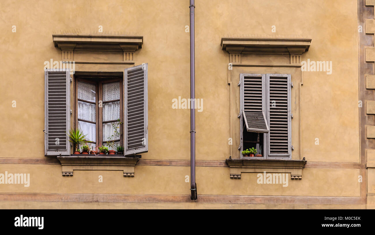Two Windows in Tuscany with Shutters and Plants Stock Photo - Alamy