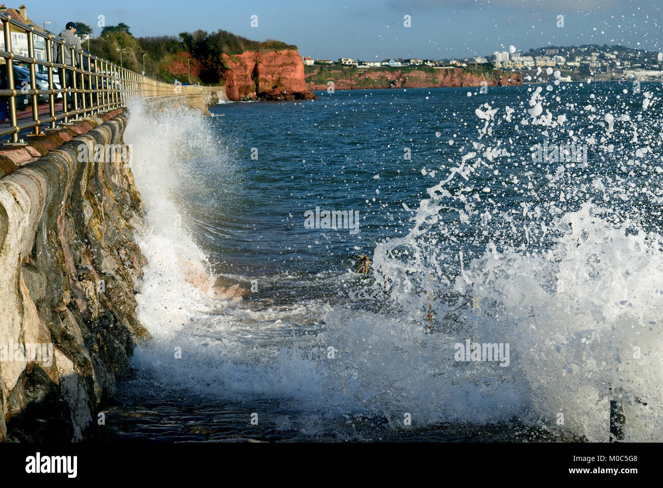 Waves crashing against the sea wall at high tide Stock Photo - Alamy