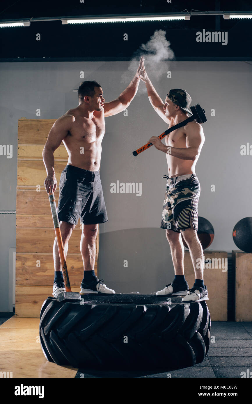 Men doing high five hi-res stock photography and images - Alamy