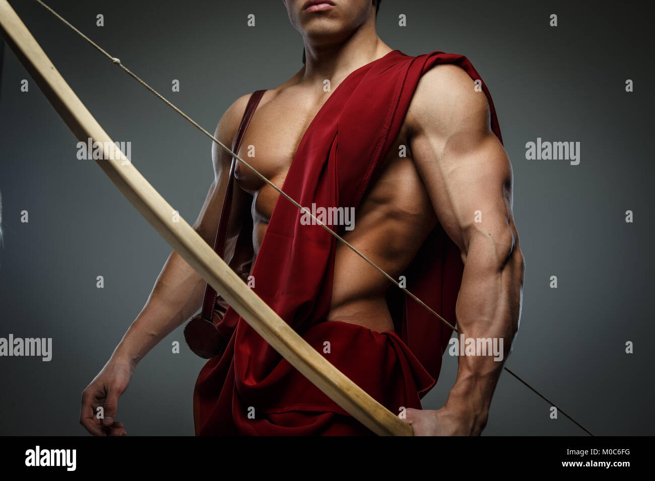 Wounded gladiator with bow Stock Photo - Alamy