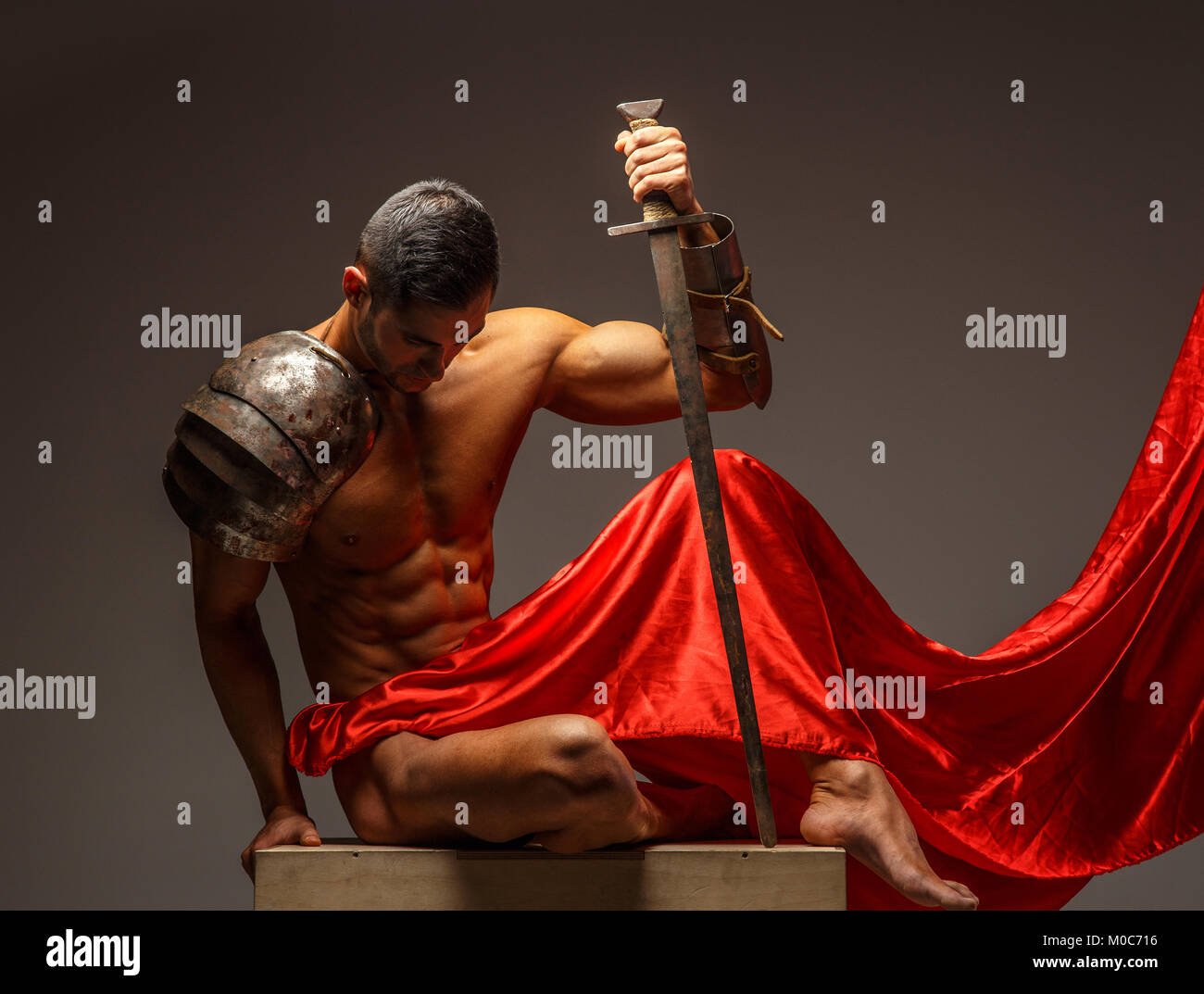 Handsome muscular warrior sword hi-res stock photography and images - Alamy