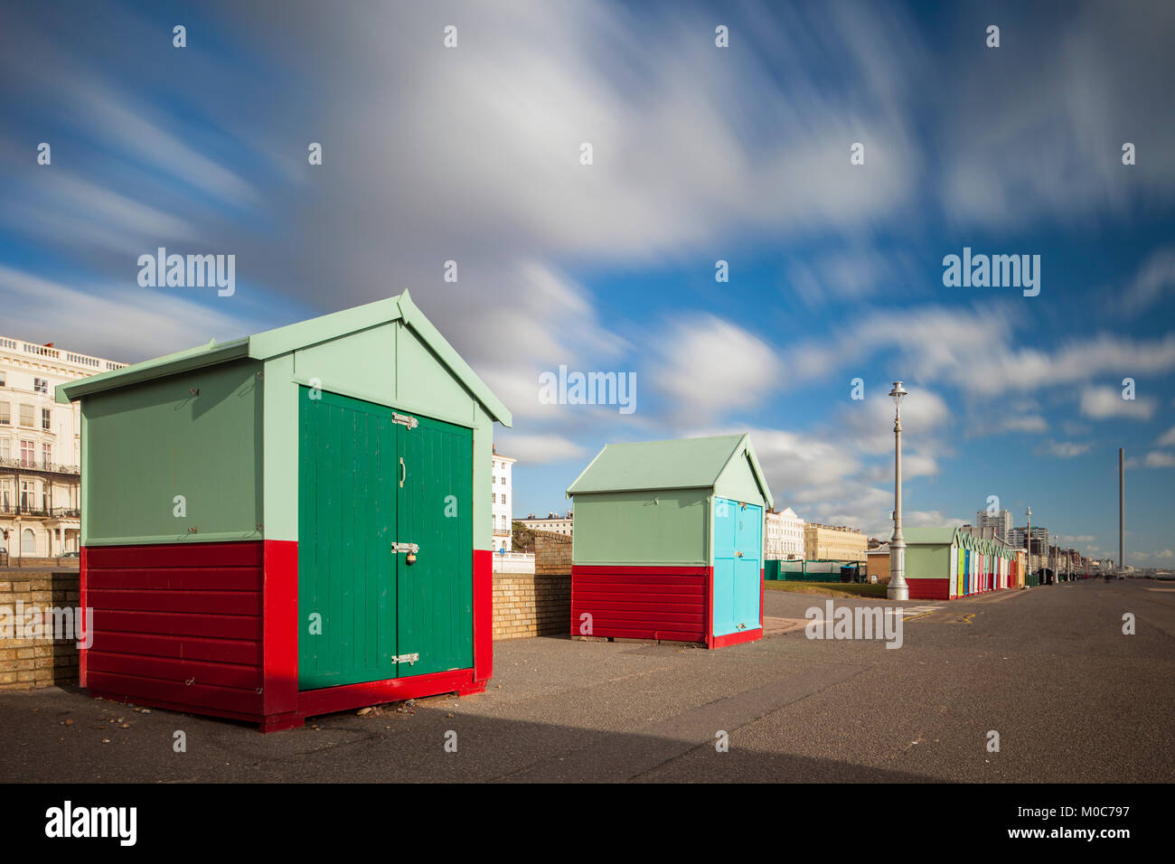 Iconic colourful beach huts on Brighton seafront, East Sussex, England ...