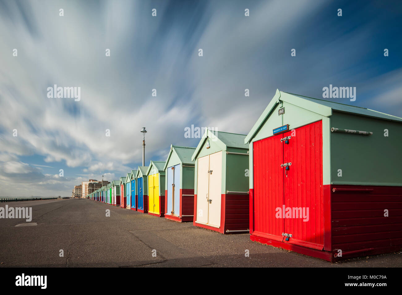 Iconic colourful beach huts on Brighton seafront, East Sussex, England ...