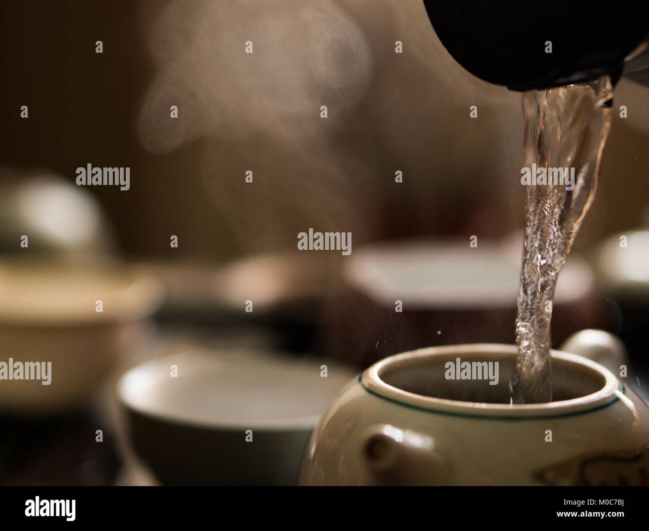 Green Tea Pouring in Traditional Chinese Tea Ceremony Stock Photo - Alamy