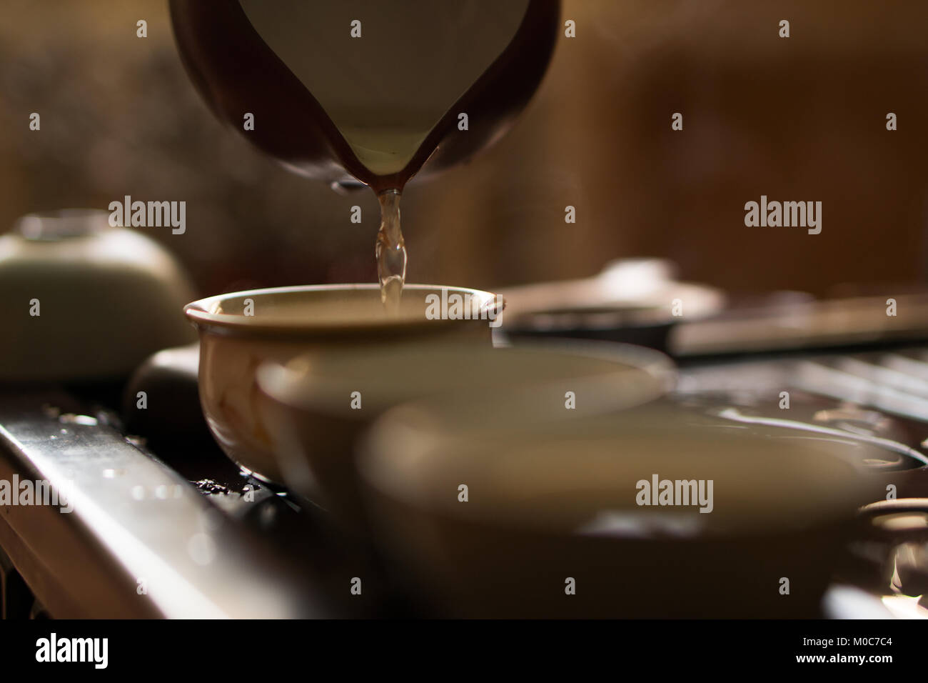 Green Tea Pouring in Traditional Chinese Tea Ceremony Stock Photo - Alamy