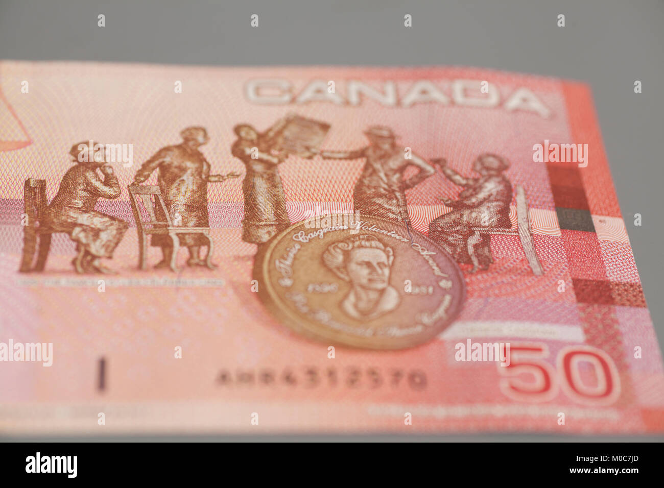 Canadian 50 dollars on a gray background Stock Photo - Alamy
