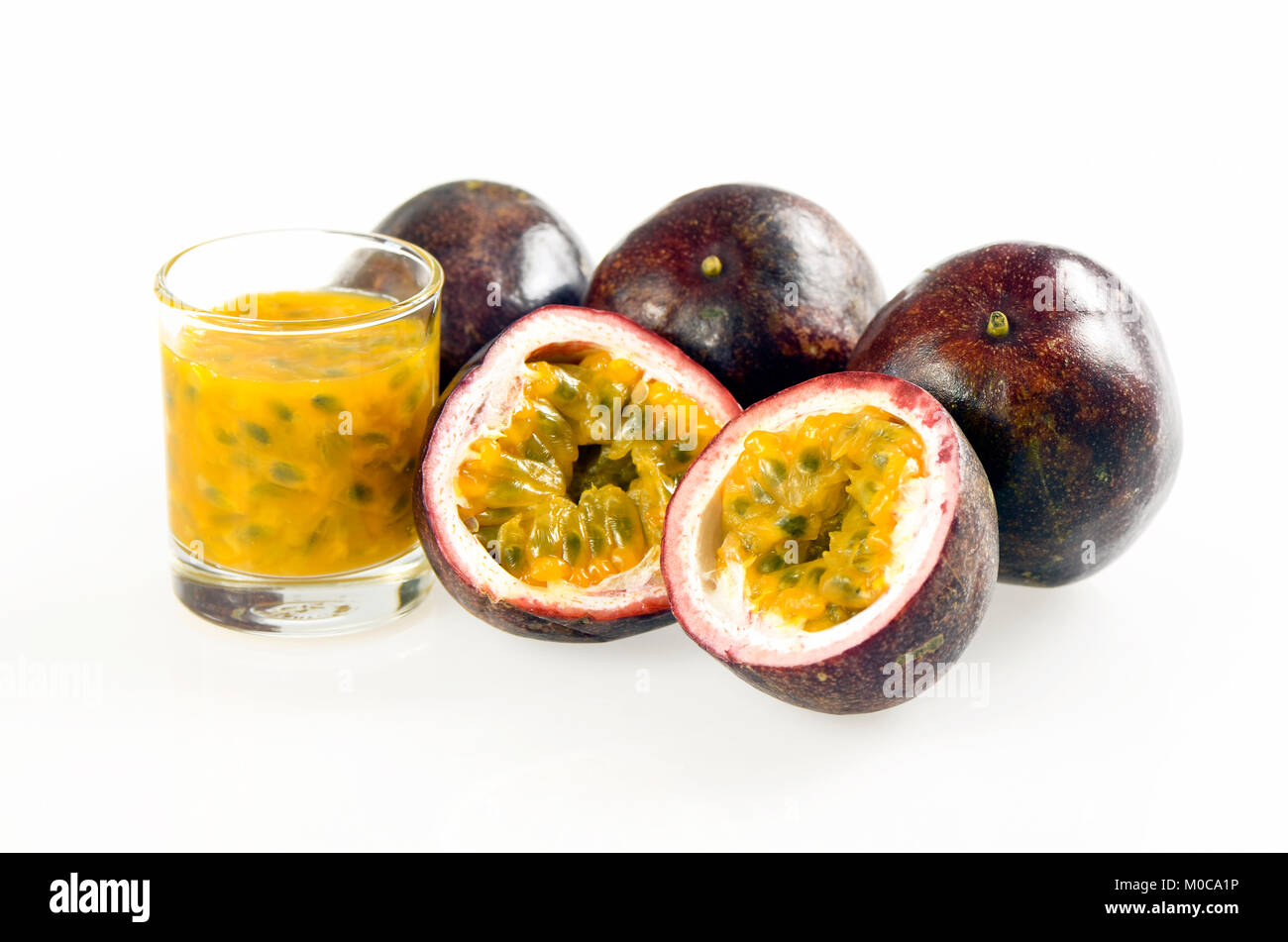 Purple passion fruit (Passiflora edulis) on white background Stock ...