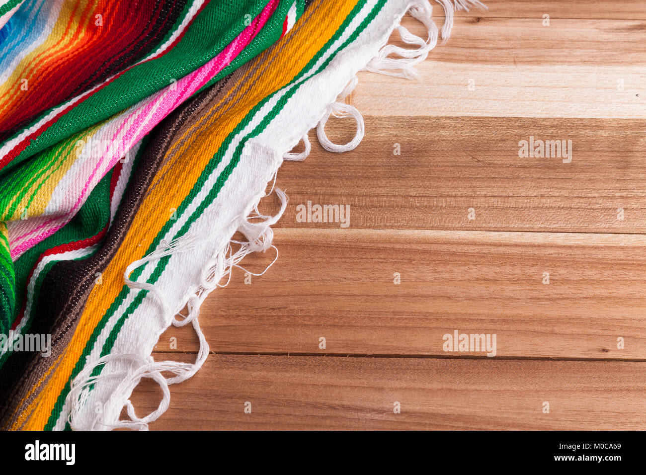 Traditional colorful Mexican serape on a table Stock Photo - Alamy