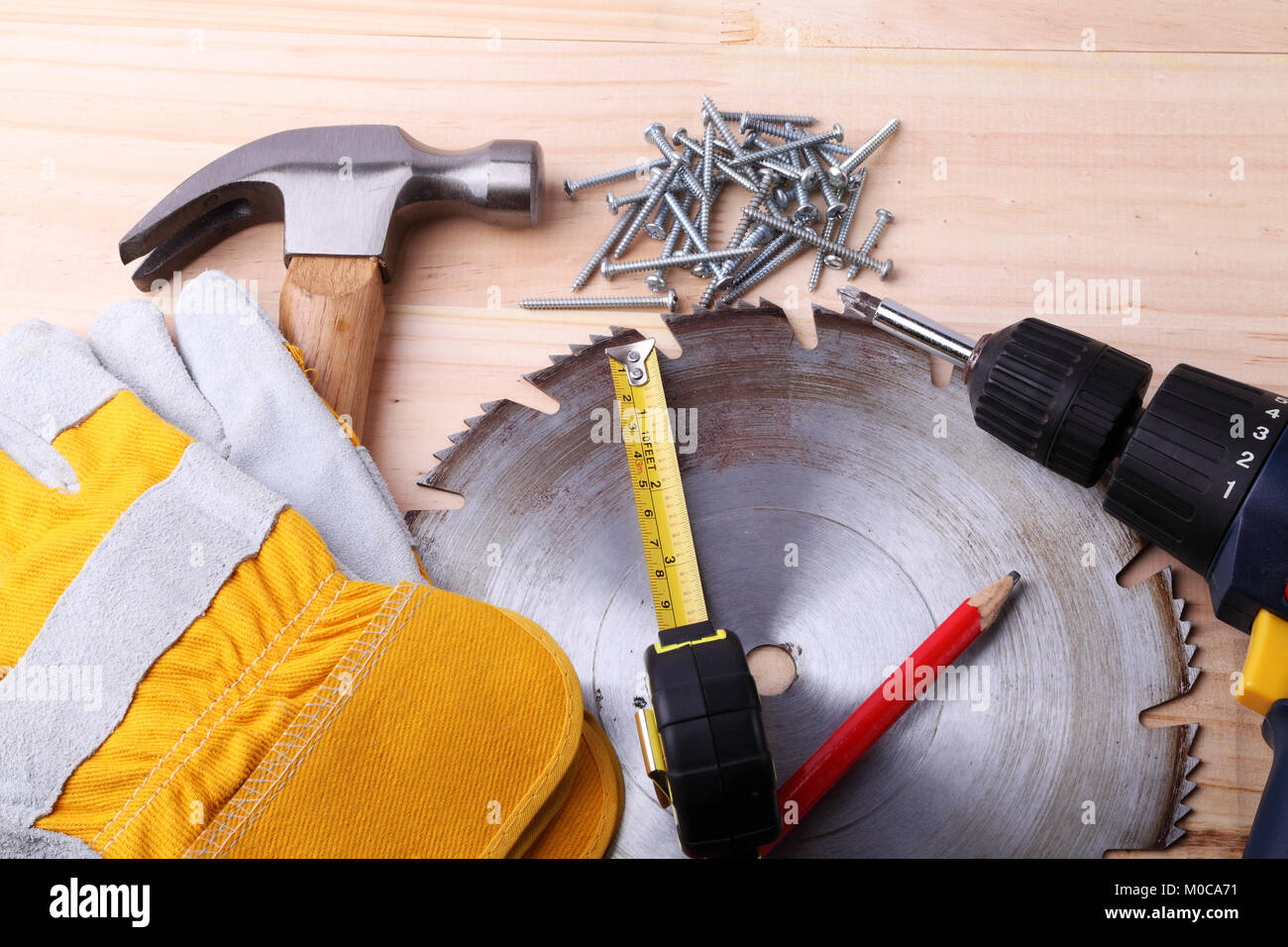 Tools on a wooden surface Stock Photo - Alamy