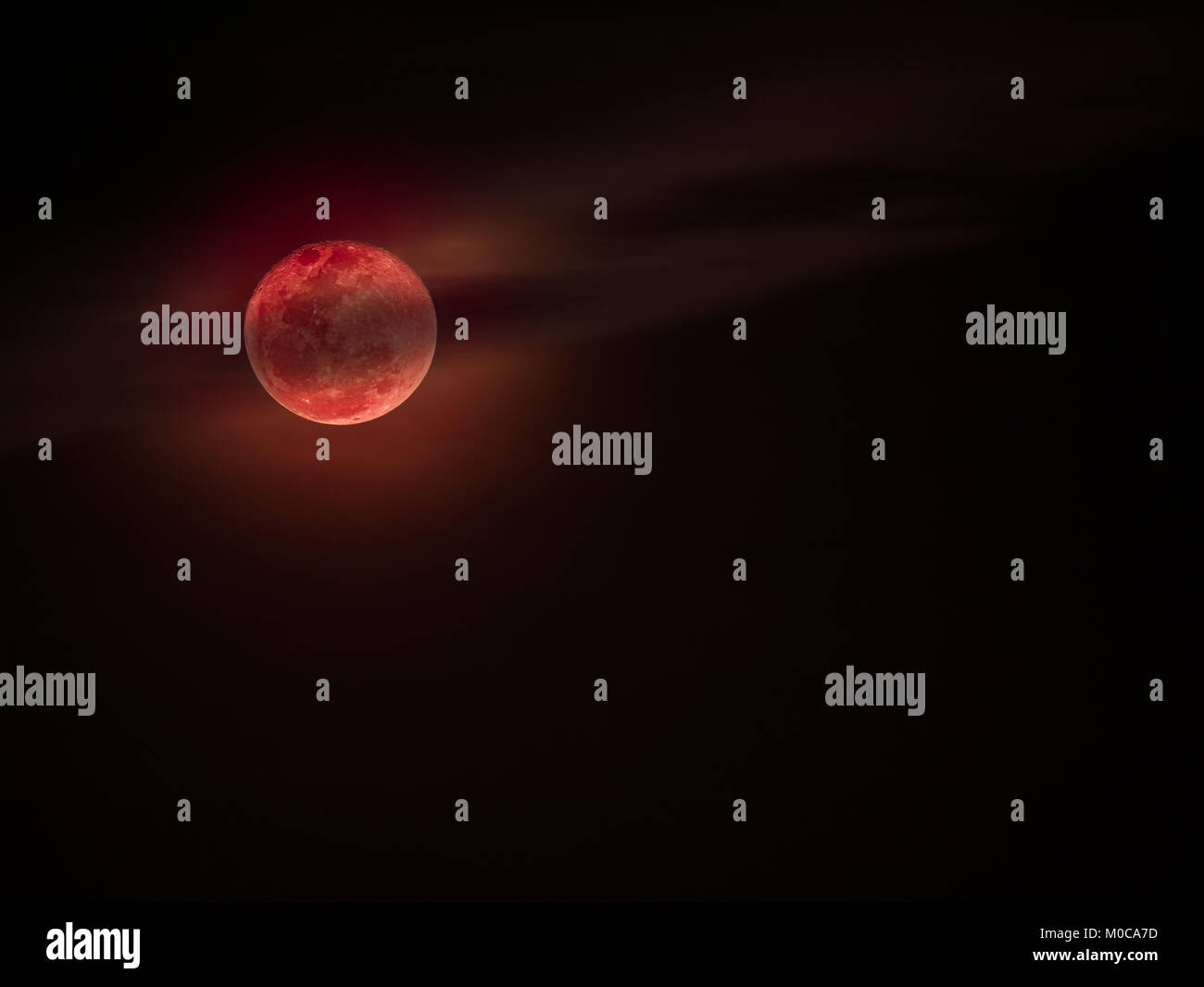 Bloodmoon or red moon,a natural phenomenon,with cloud on dark sky Stock ...