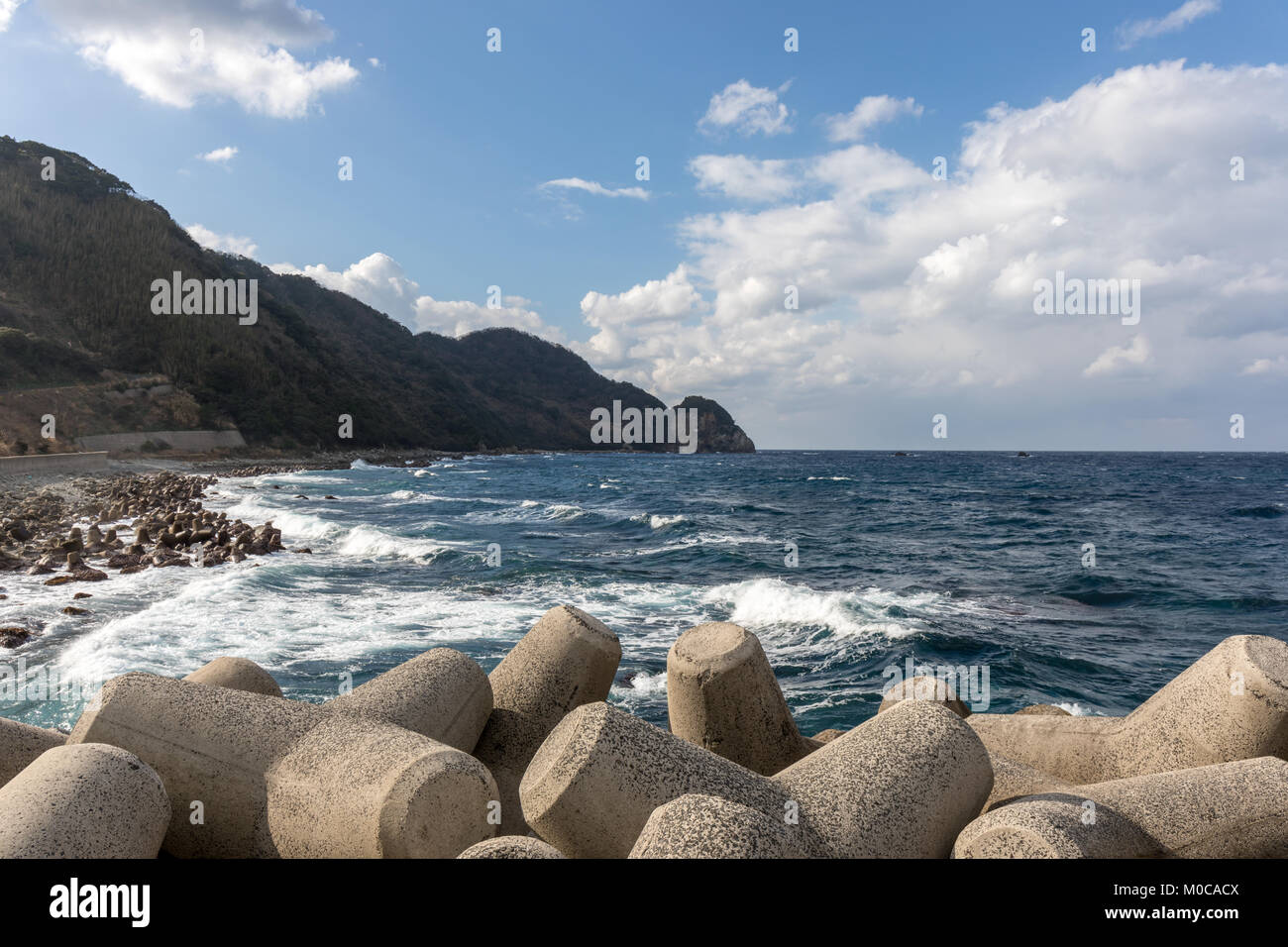 Sea, mountains and tetrapod breakwater; Chigocho, Shimane Prefecture ...