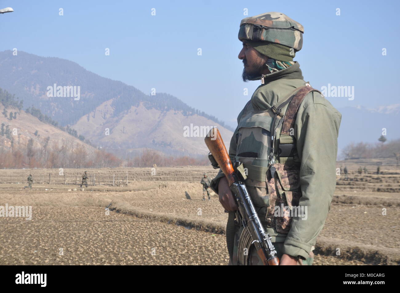 Indian Soldier Standing With Gun