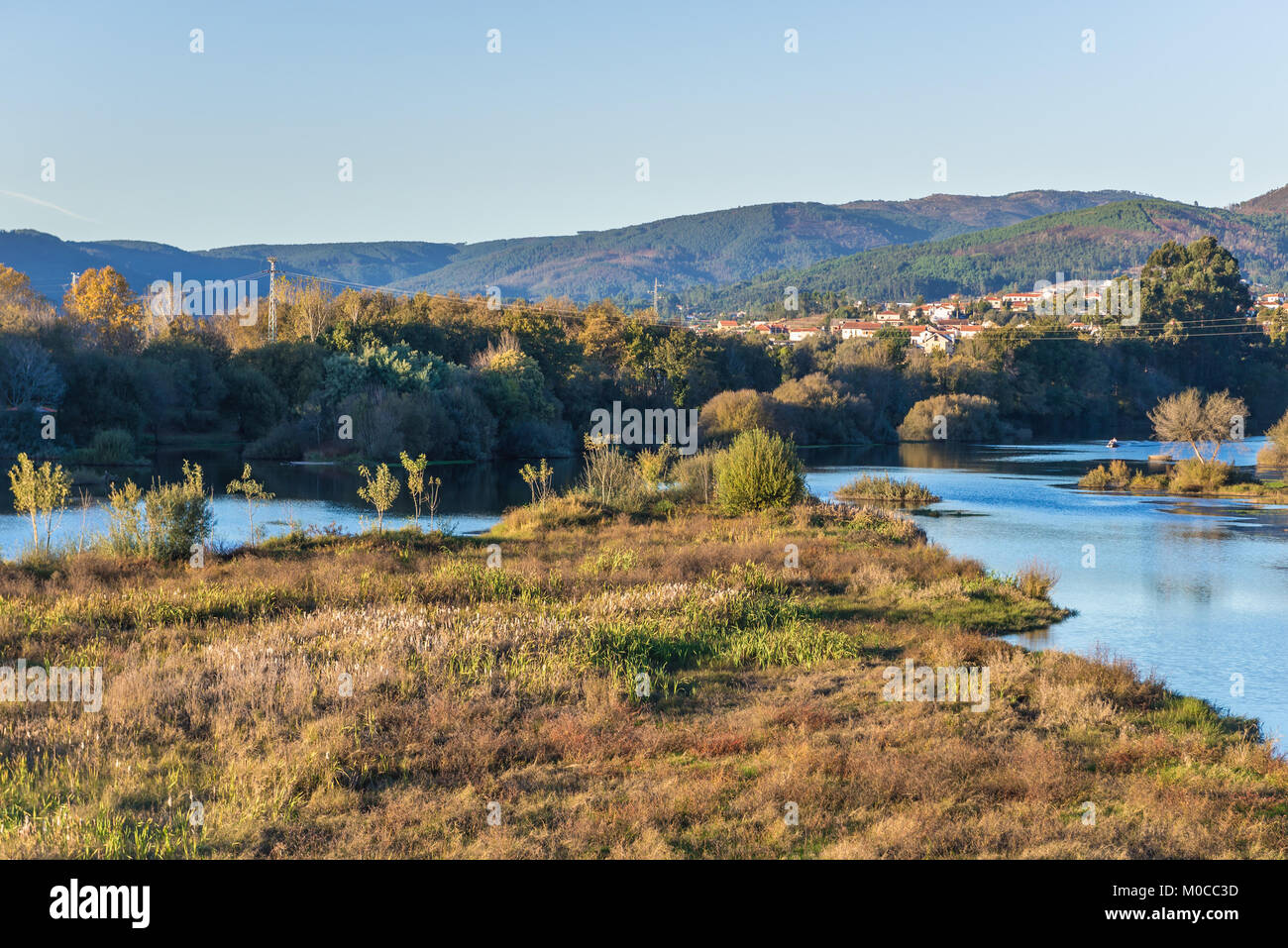 View from Roman bridge on Lima River in Ponte de Lima city, part of the ...