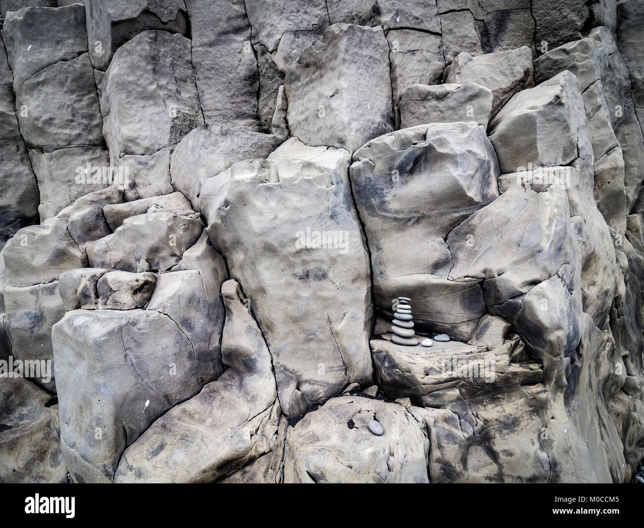 Dark Basalt columns and stack of rocks at Reynisfjara, black sand beach ...