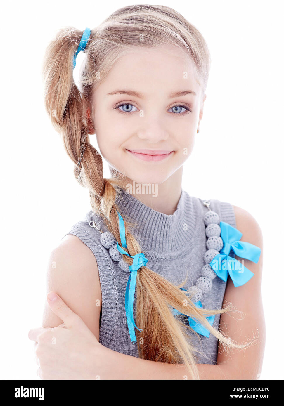 Cute little girl with blue eyes Stock Photo - Alamy