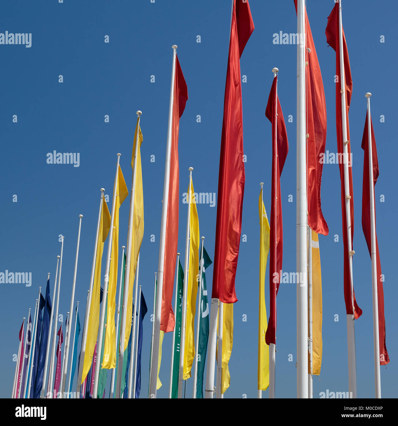 Colorful Groups of Flags against Blue Sky Stock Photo - Alamy