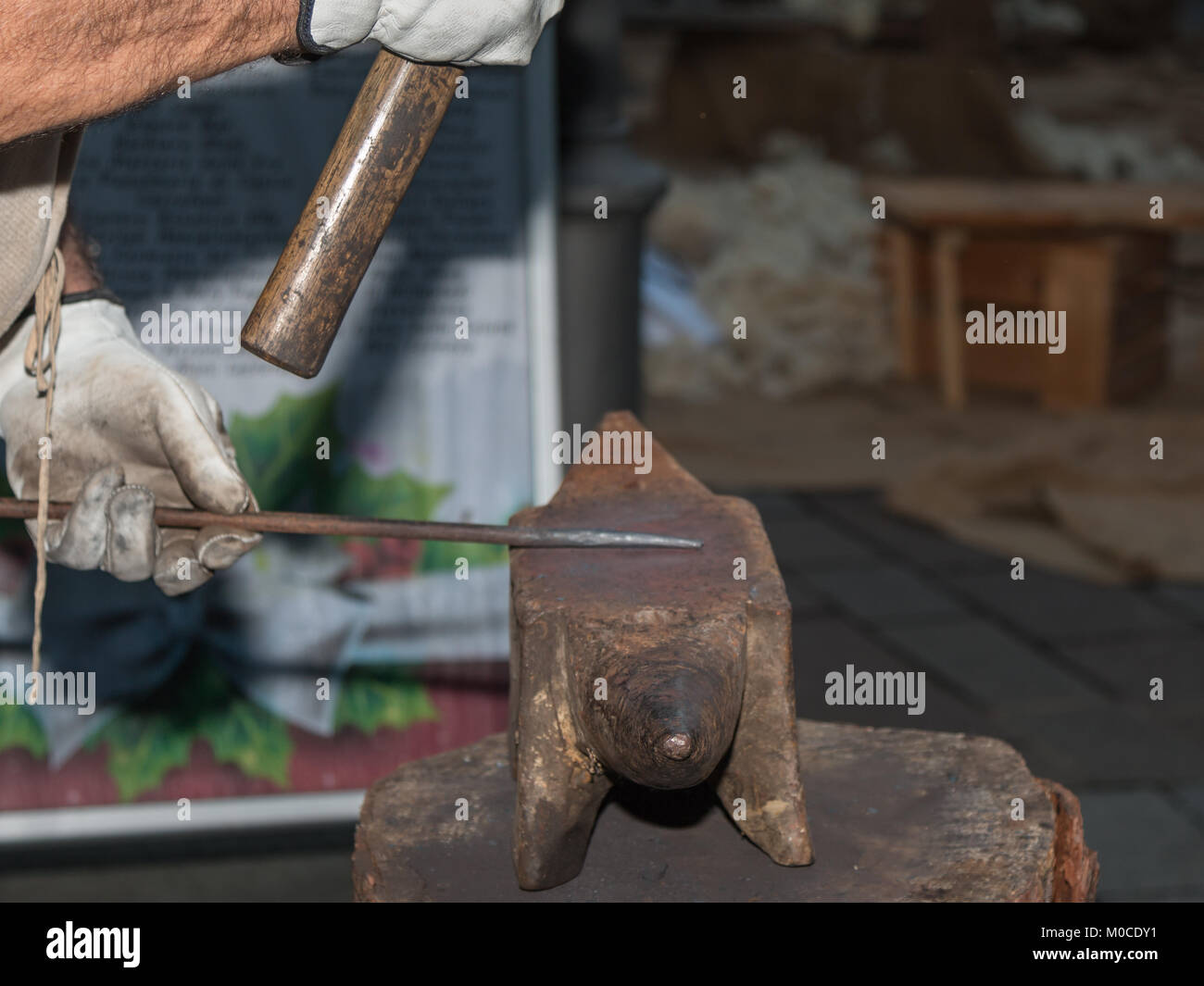 Blacksmith Forging Iron with Hammer and Anvil Stock Photo - Alamy