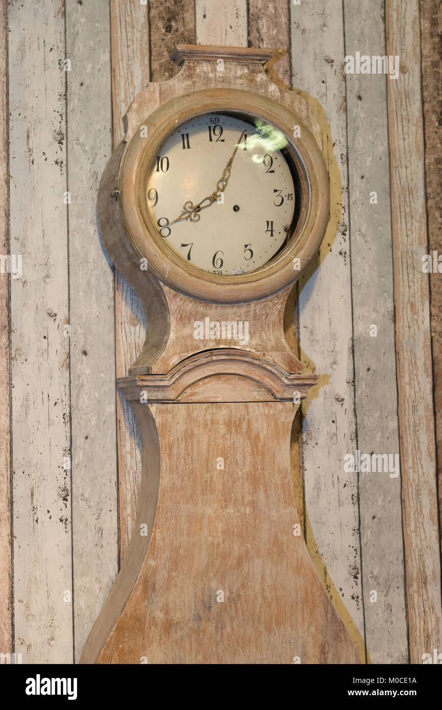 Antique Wall Clock on Wooden background, Vintage Theme Stock Photo - Alamy