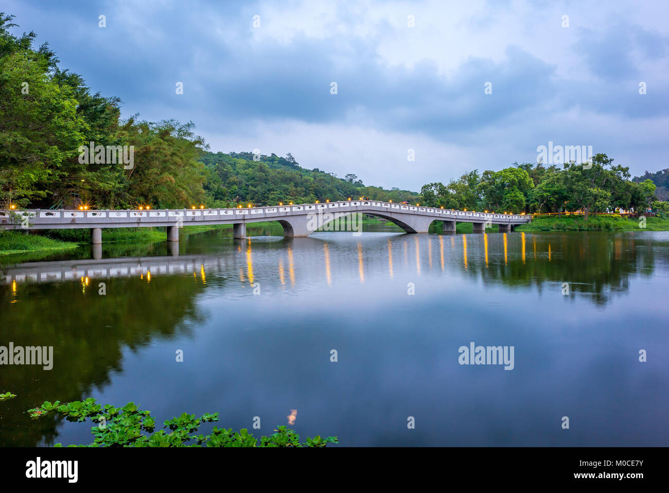 green grass lake with beautiful bridge in Hsinchu Stock Photo - Alamy