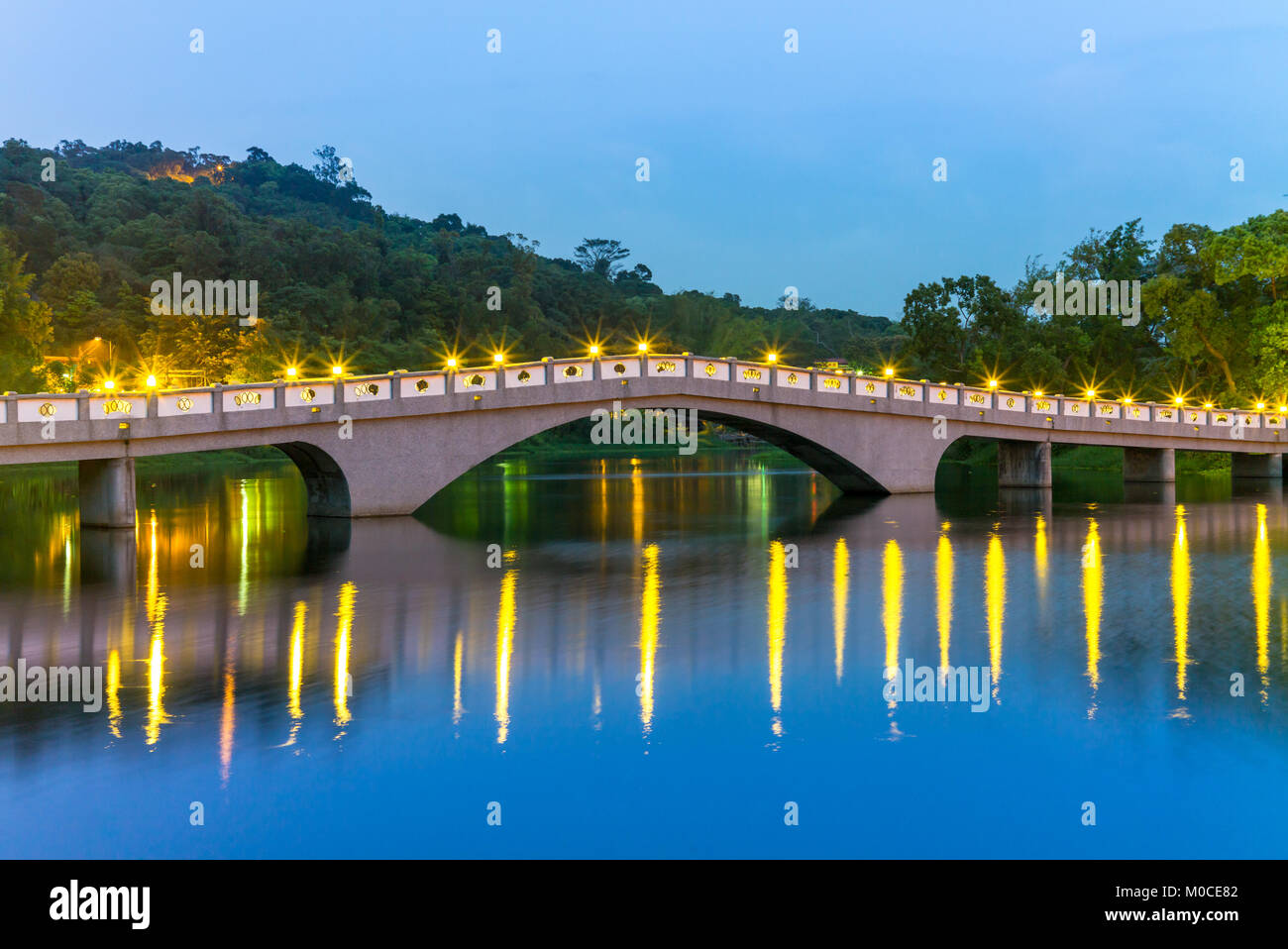 green grass lake with beautiful bridge in Hsinchu Stock Photo - Alamy