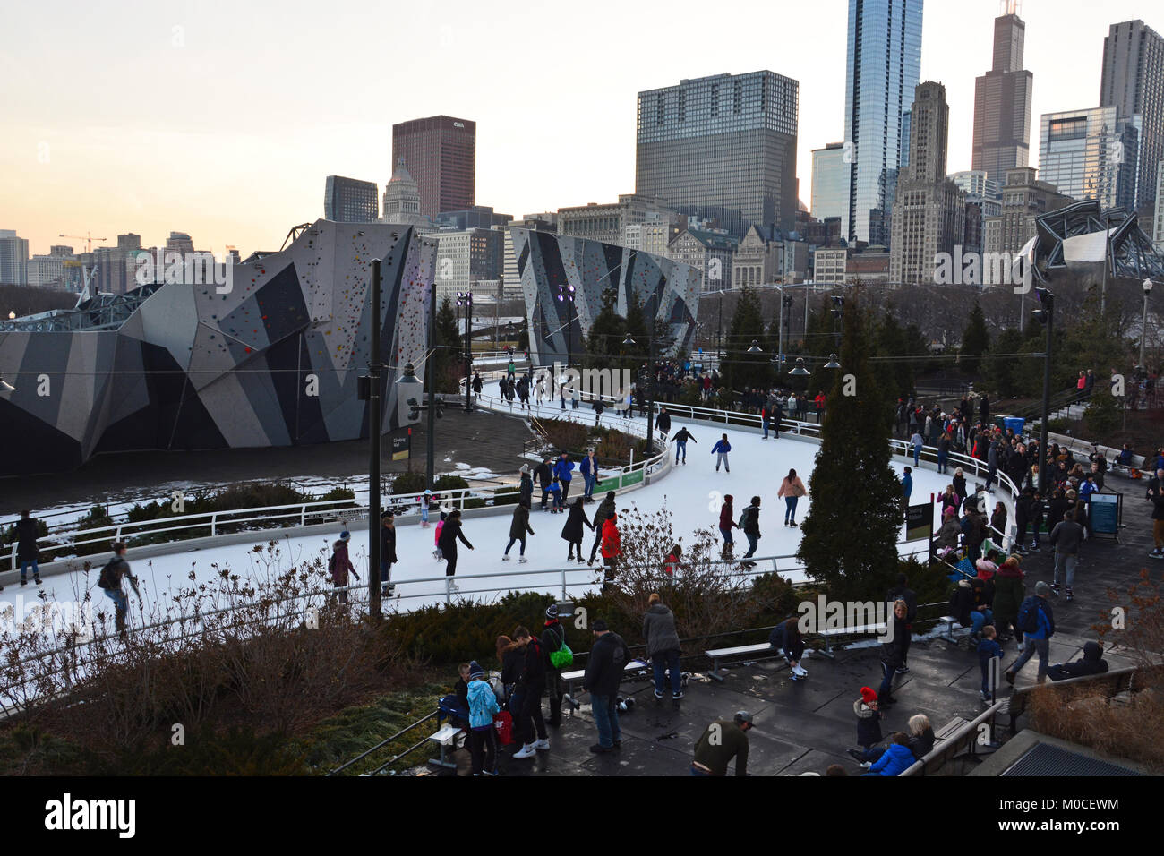 Visitors enjoy outdoor ice skating at the quarter mile long Skating ...