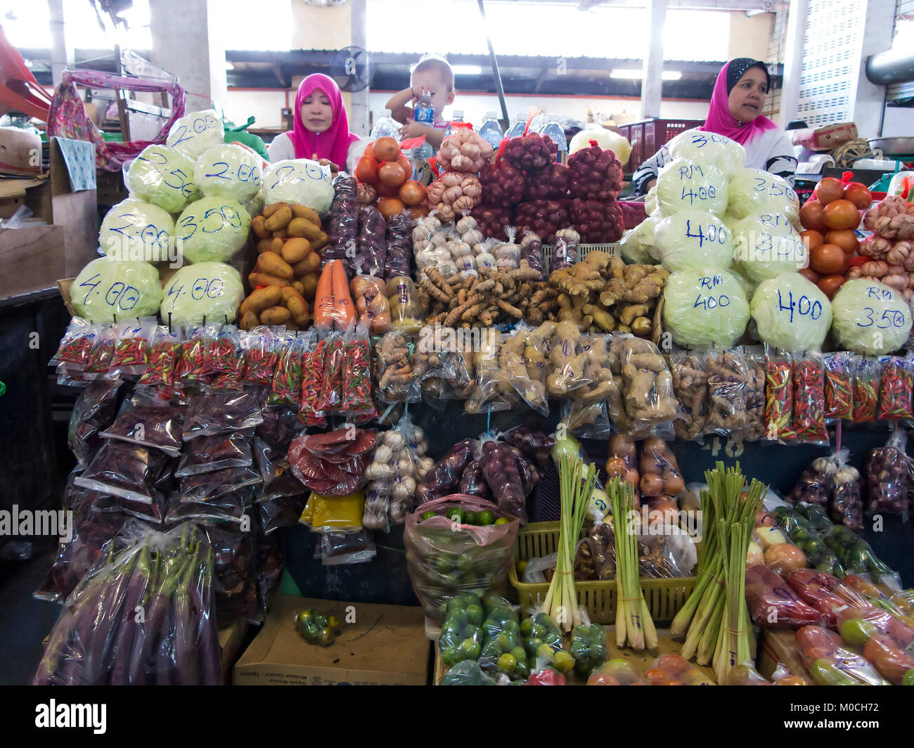 Fresh Produce Stall with people in attendance Stock Photo - Alamy