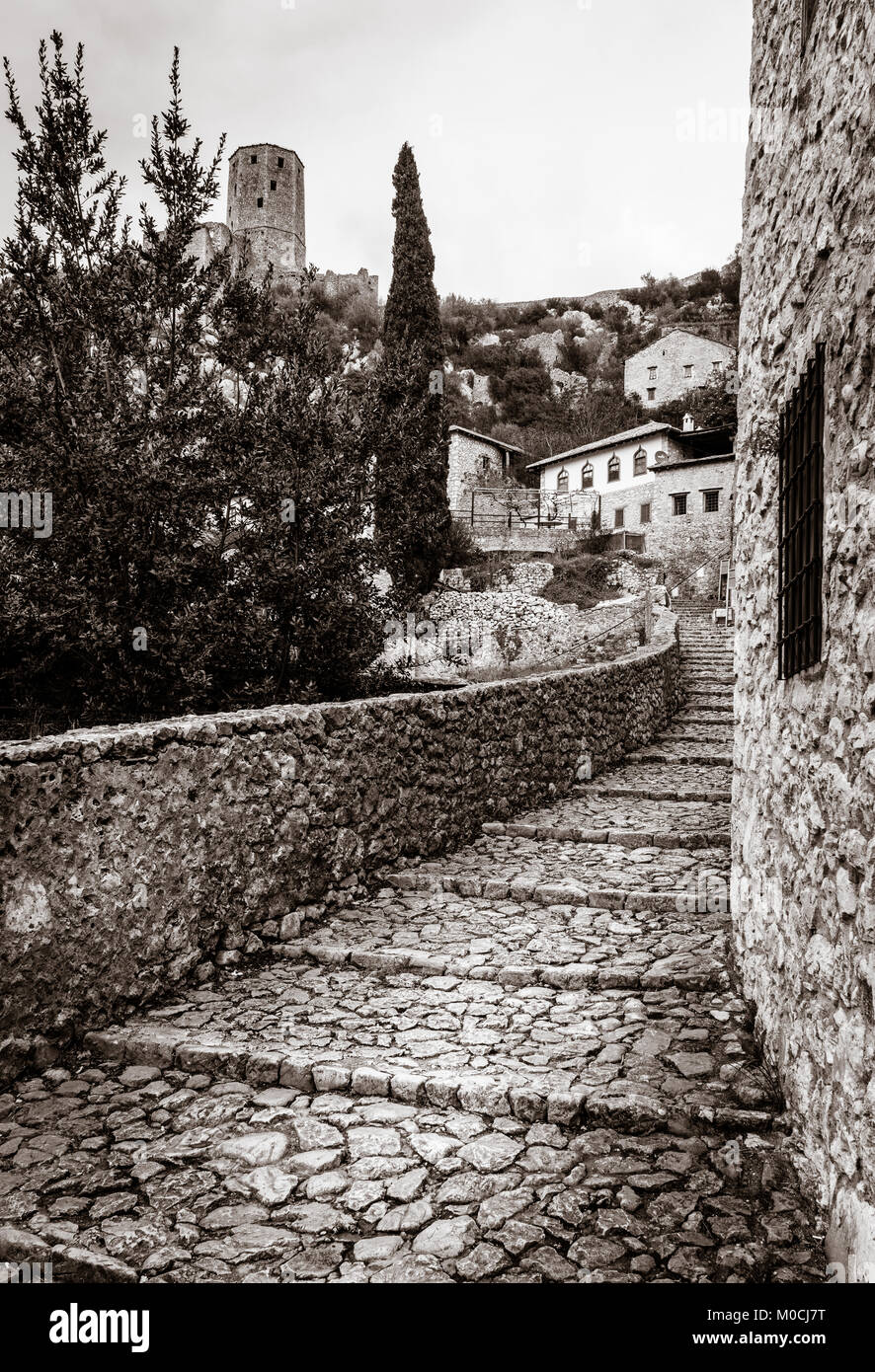 Medieval cobblestone street in a small Bosnian town of Pocitelj Stock ...