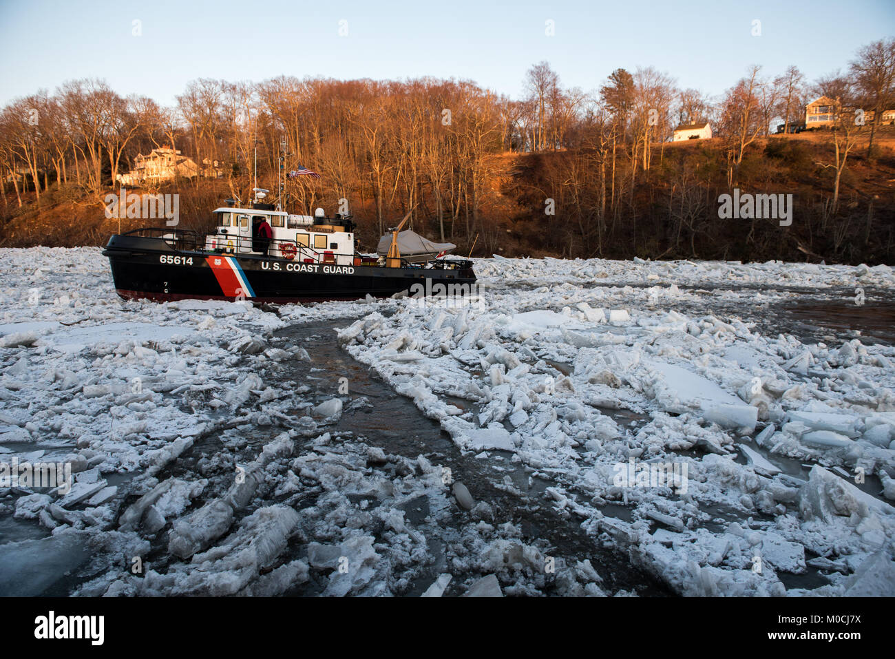 U.S. Coast Guard Cutter Bollard, a 65-foot Small Harbor Tug, transits ...