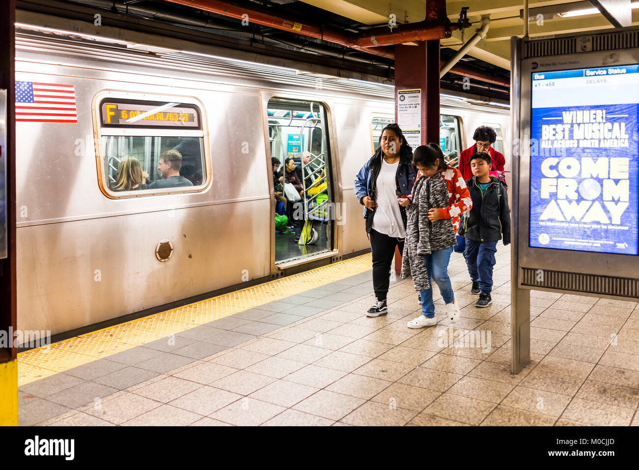 Woman standing packed underground hi-res stock photography and images ...