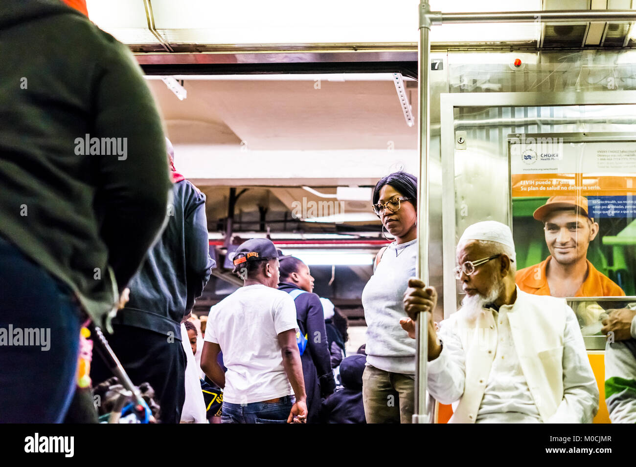 Crowded subway train in new hi-res stock photography and images - Alamy