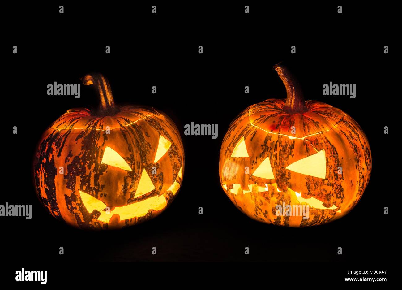 Halloween pumpkin in front of black background Stock Photo - Alamy