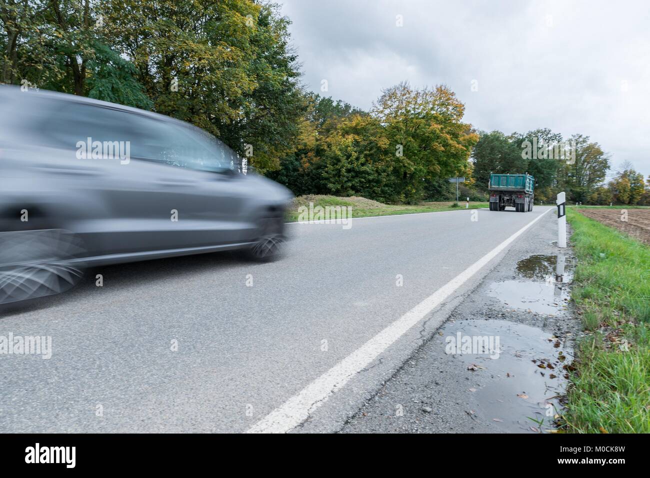 Car passing by on a national highway, Germany Stock Photo - Alamy