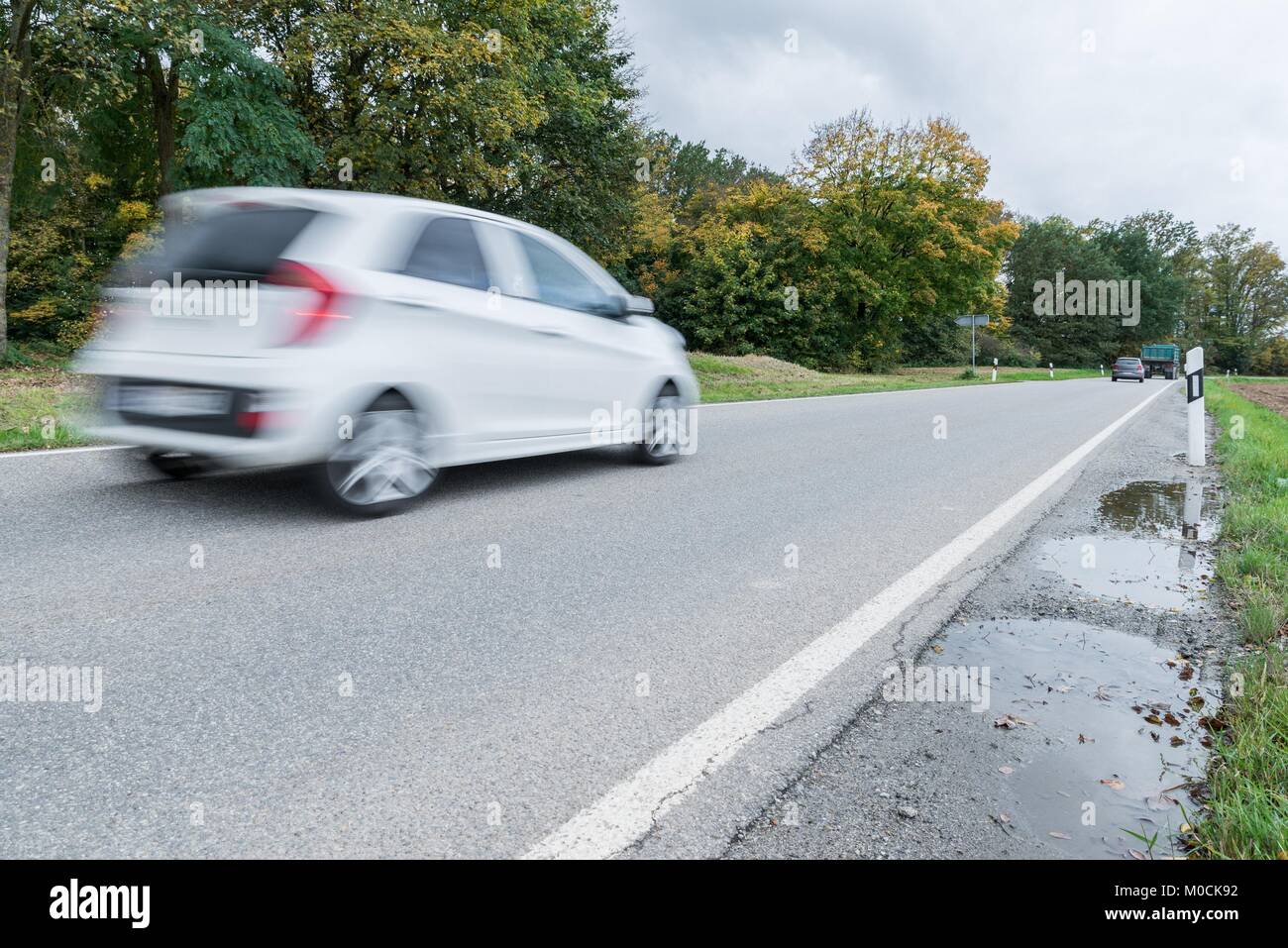 Car passing by on a national highway, Germany Stock Photo - Alamy