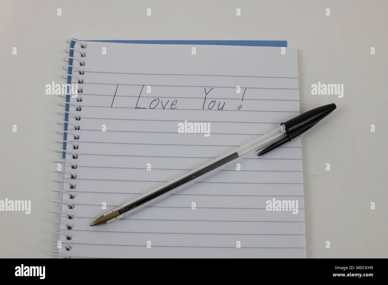 Handwriten ‘I love you’ on notepad Stock Photo - Alamy